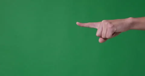 Hand pointing finger over green backgrou... | Stock Video | Pond5