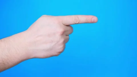 Hand pointing to the side isolated on bl... | Stock Video | Pond5