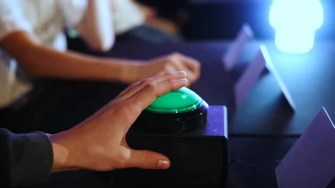 hand presses buzzer, push green trivia q... | Stock Video | Pond5