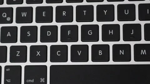 Hand Presses Letter Buttons On Modern La... | Stock Video | Pond5