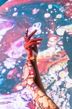 Hand reaching amidst spiritual patterns ~ Premium Photo #255766189