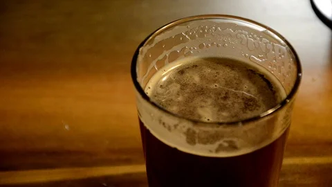 Hand Reaching for Pint at Micro Brewery ... | Stock Video | Pond5