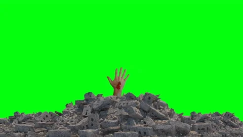 Hand rising out of rubble on green scree... | Stock Video | Pond5
