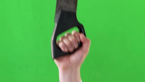 Hand with saw. Green screen chroma key b... | Stock Video | Pond5