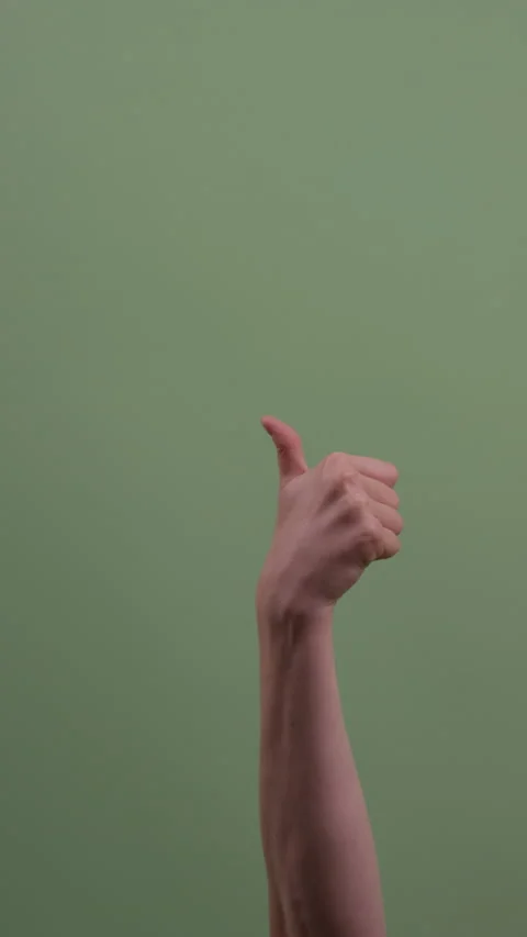 Hand From Off Screen Giving Thumbs up Fr... | Stock Video | Pond5