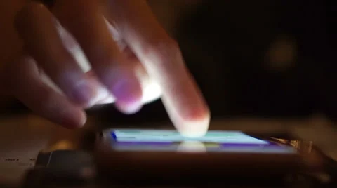 Hand scrolling and playing smart phone a... | Stock Video | Pond5