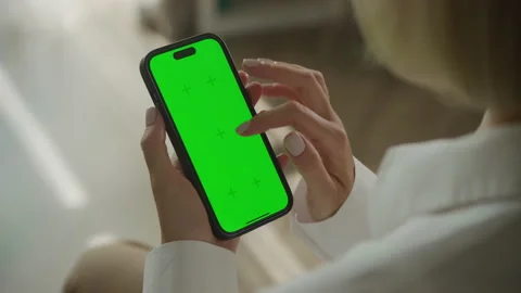 Hand scrolling on green screen smartphon... | Stock Video | Pond5