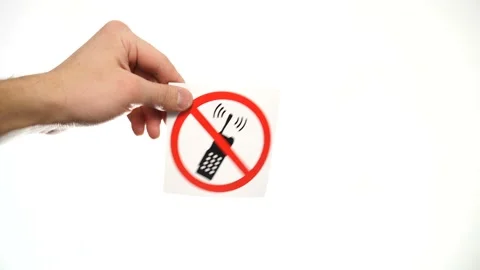 Hand showing warning sign "No phone" iso... | Stock Video | Pond5