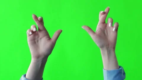Hand shows gesture fingers crossed. Gree... | Stock Video | Pond5