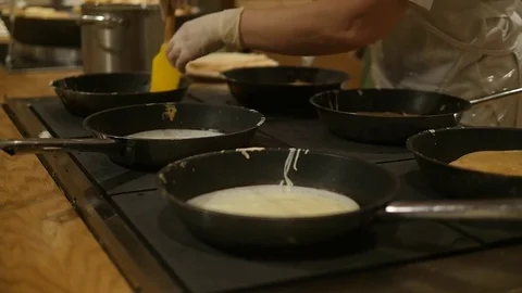 Hand With Special Tools Cooking Pancakes... | Stock Video | Pond5