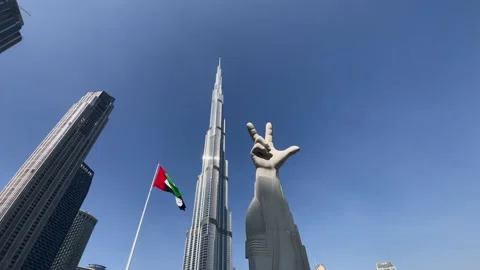 Hand statue in Downtown Dubai, Dubai, UA... | Stock Video | Pond5