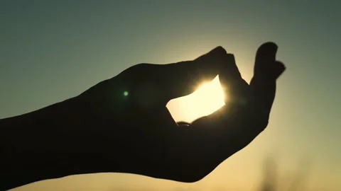hand sunset in the sky. yoga woman at su... | Stock Video | Pond5