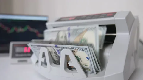 A hand switches on money counting machin... | Stock Video | Pond5