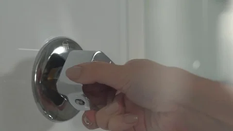 Hand turn on faucet shower cabin. Openin... | Stock Video | Pond5