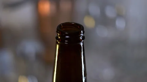 Hand twists off beer bottle cap and fros... | Stock Video | Pond5
