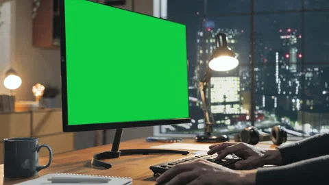 hand typing on keyboard computer green s... | Stock Video | Pond5