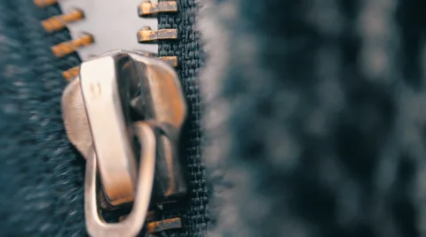 Hand unzipped and fasten golden colored ... | Stock Video | Pond5