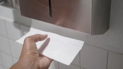 Hand Using Paper Towel Dispenser in a Hy... | Stock Video | Pond5