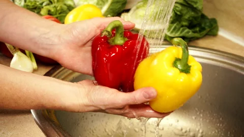 Hand washing bell pepper vegetable in ki... | Stock Video | Pond5