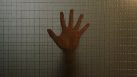 hand on window dying trapped behind glas... | Stock Video | Pond5