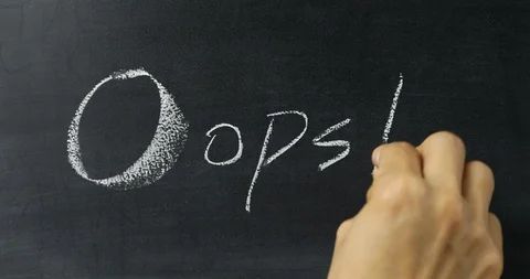 Hand writing Oops! on chalkboard | Stock Video | Pond5