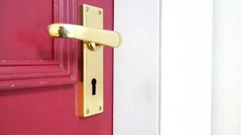 Hand of young man locks a door with a ke... | Stock Video | Pond5