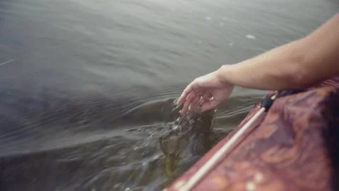 The hand of a young woman dragging and s... | Stock Video | Pond5
