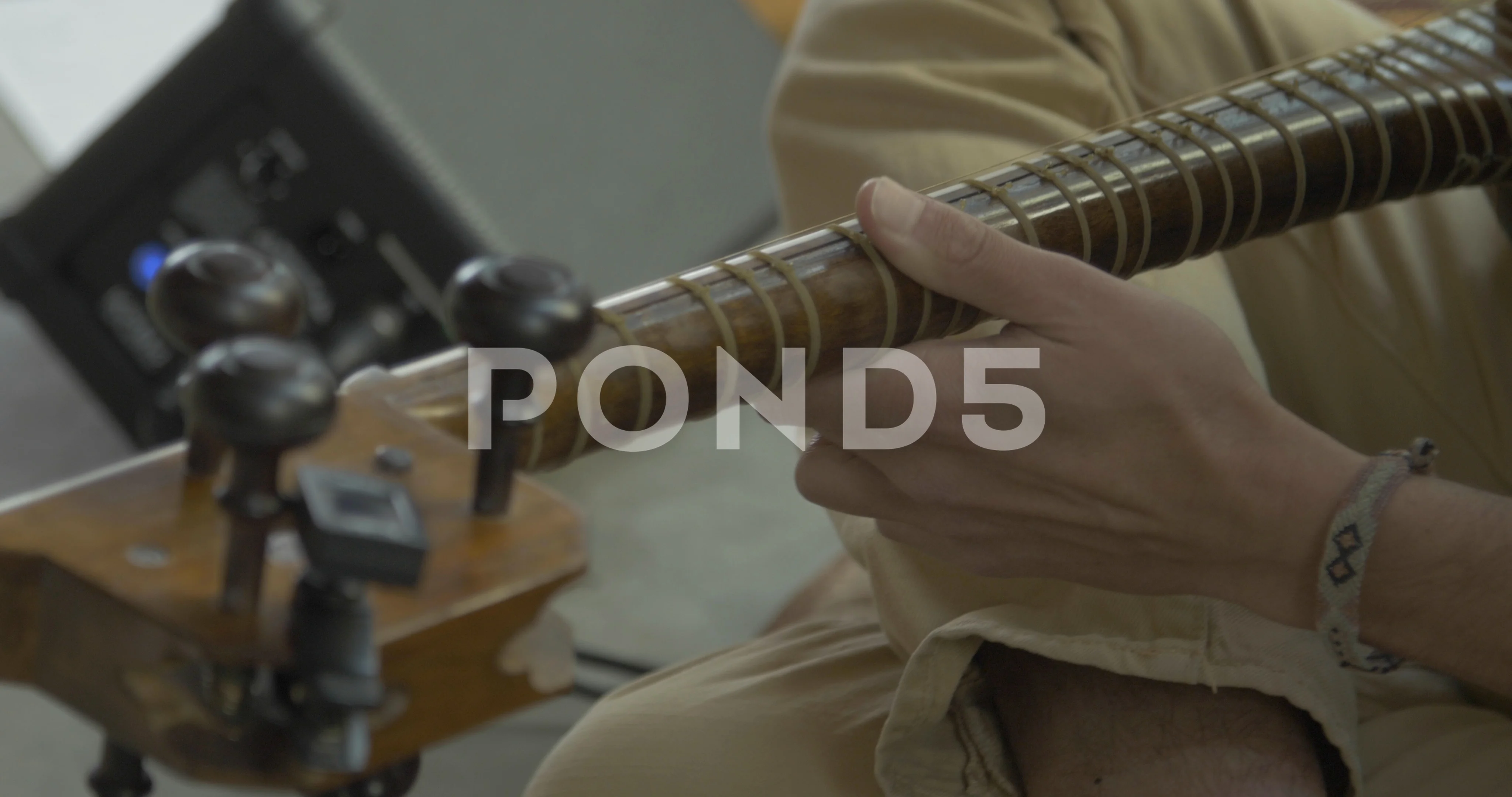 Handheld String Instruments