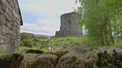 Handheld reveal of Dolbadarn Castle from... | Stock Video | Pond5