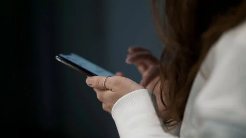Handheld shot close up of woman hands ty... | Stock Video | Pond5