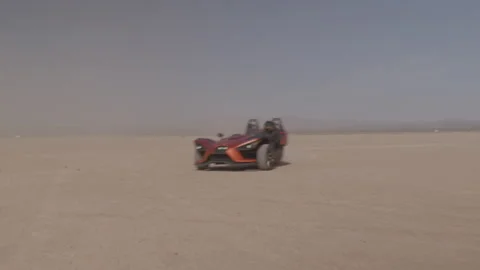 Handheld shot of red racing car driving ... | Stock Video | Pond5