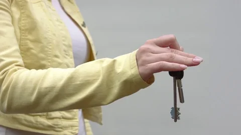 Handing Keys Stock Footage ~ Royalty Free Stock Videos | Pond5