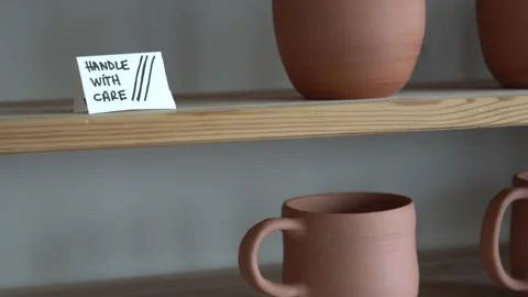 Handmade clay pottery on the display | Stock Video | Pond5