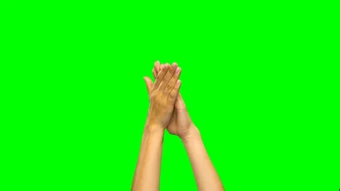 Hands are clapping against a green scree... | Stock Video | Pond5