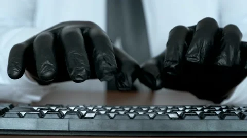 Hands in black gloves typing on the keyb... | Stock Video | Pond5