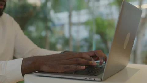 Hands of Black Man Typing on Laptop at C... | Stock Video | Pond5