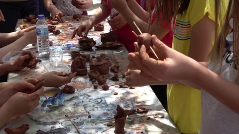 Hands of children moulding out of clay a... | Stock Video | Pond5