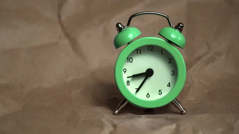 Hands of the Classic Alarm Clock Count t... | Stock Video | Pond5