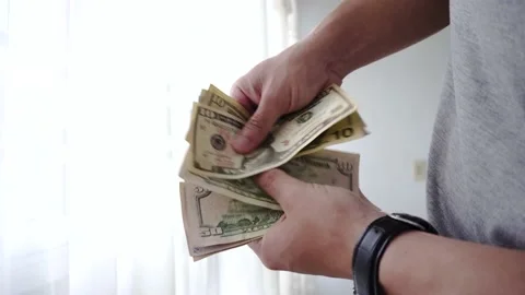 Hands counting money in cash | Stock Video | Pond5
