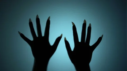 Hands of demonic creature scratching gla... | Stock Video | Pond5