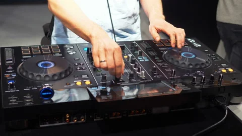 Hands on DJ sound console in 4k slow mot... | Stock Video | Pond5
