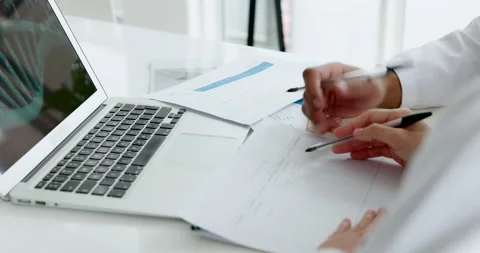 Hands, documents and writing with a medi... | Stock Video | Pond5
