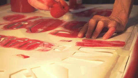 Hands draw a lettering through the stenc... | Stock Video | Pond5