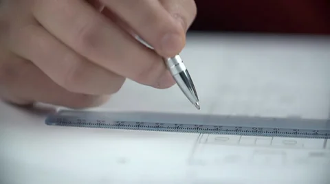 Hands draw lines with biro using the rul... | Stock Video | Pond5