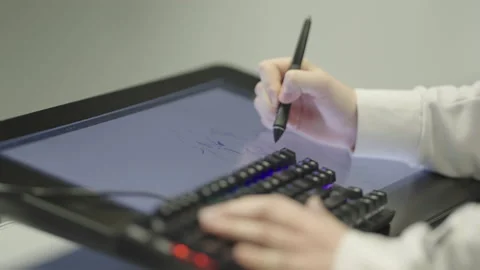 Hands drawing on big drawing tablet scre... | Stock Video | Pond5