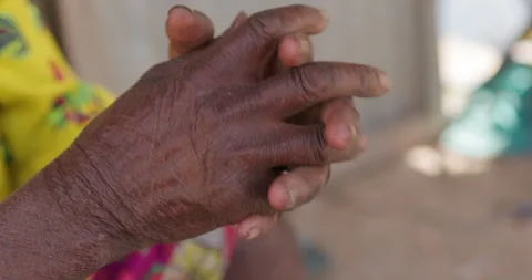 Hands on an elderly African woman in Mal... | Stock Video | Pond5