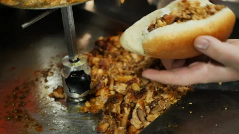 The hands of a fast food chef holding cu... | Stock Video | Pond5