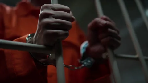 Hands Jail Bars Stock Videos – Royalty-Free HD & 4K Videos