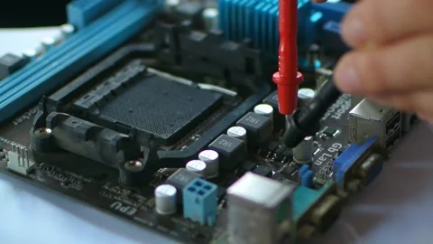 Hands fixing motherboard of pc or laptop... | Stock Video | Pond5