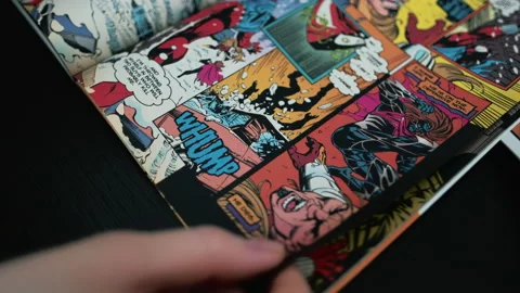 Hands flipping comic book pages. Comics ... | Stock Video | Pond5